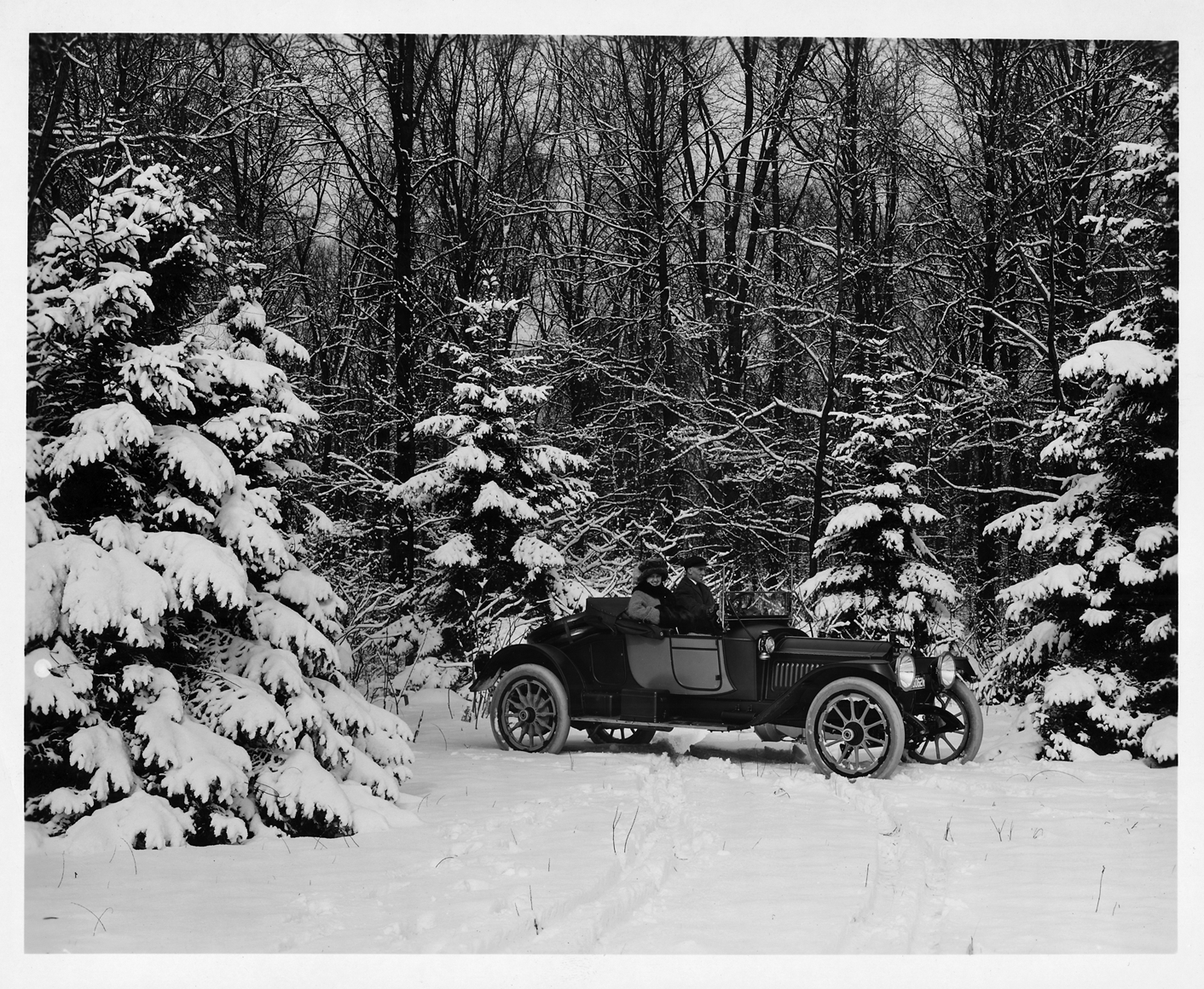 1914 Packard 2-38 phaeton runabout, on a forested snowy road | DPL DAMS