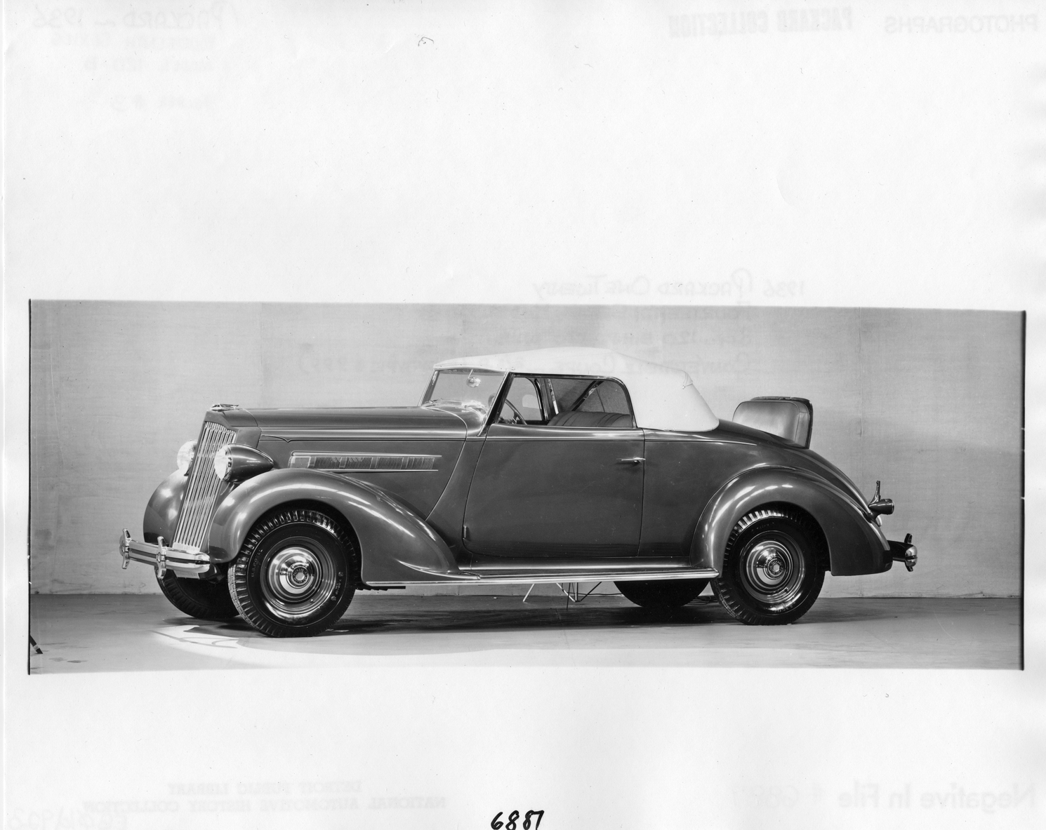 1936 Packard convertible coupe, top raised, rumble seat open | DPL DAMS