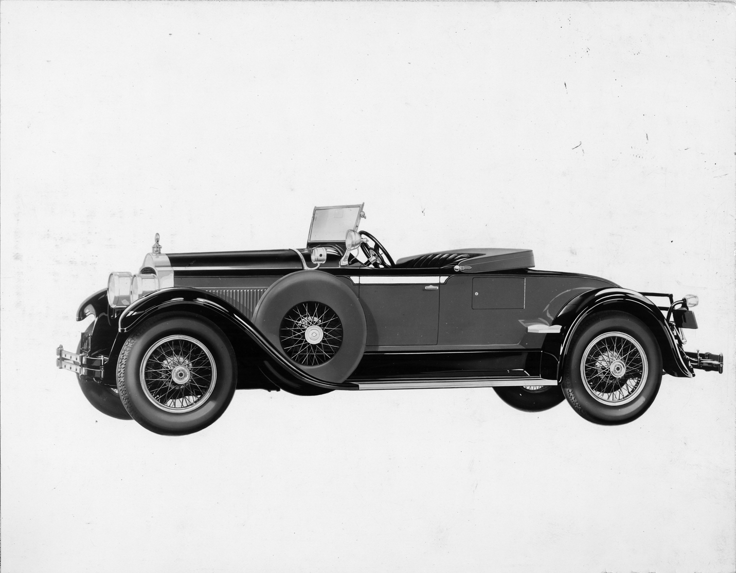 1928 Packard runabout, five-sixths left front view, top lowered, spare ...
