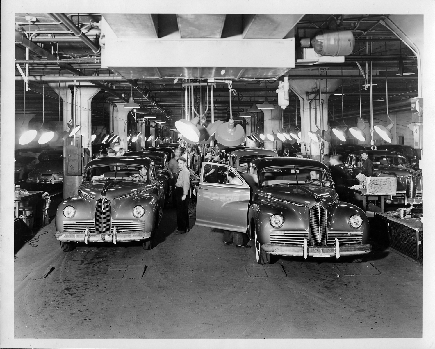 1941 Packard final assembly line, cars coming off the line | DPL DAMS