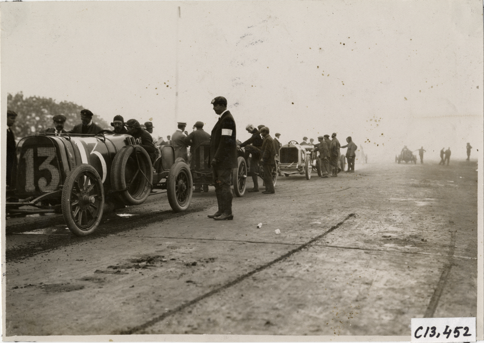 Racecars parked on course, 1908 Grand Prize races | DPL DAMS