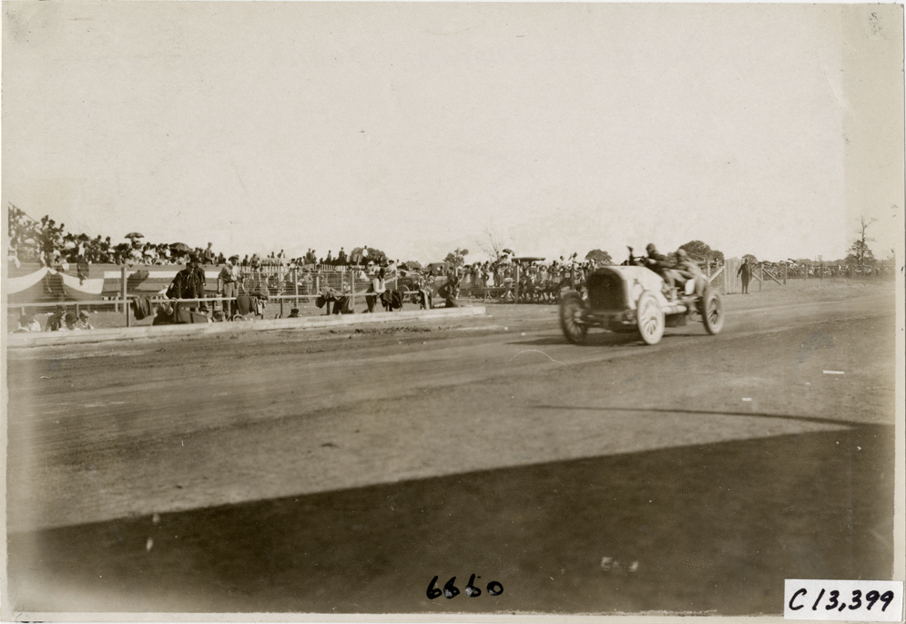 Driver and passenger in racecar, 1908 Grand Prize races | DPL DAMS