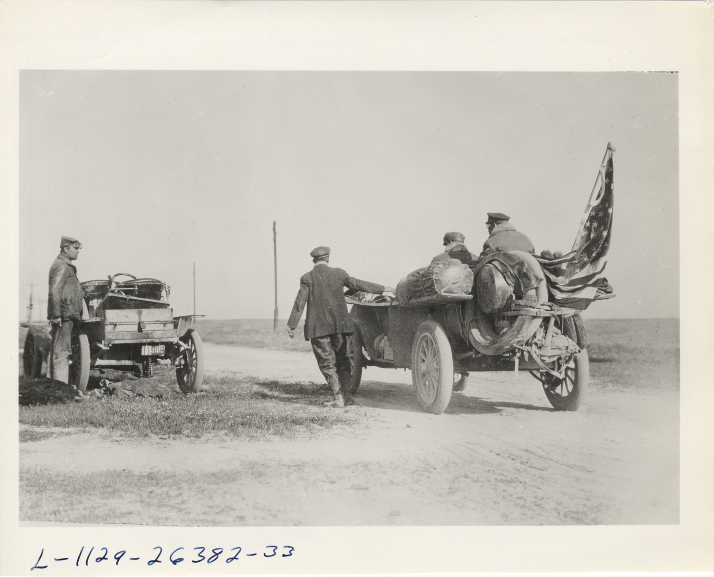 Thomas Flyer automobile and Reo pilot automobile near Laredo ...