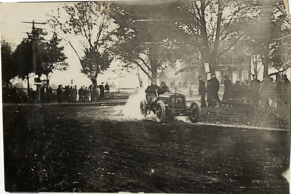 Driver and passenger in racecar, 1908 Vanderbilt Cup races | DPL DAMS