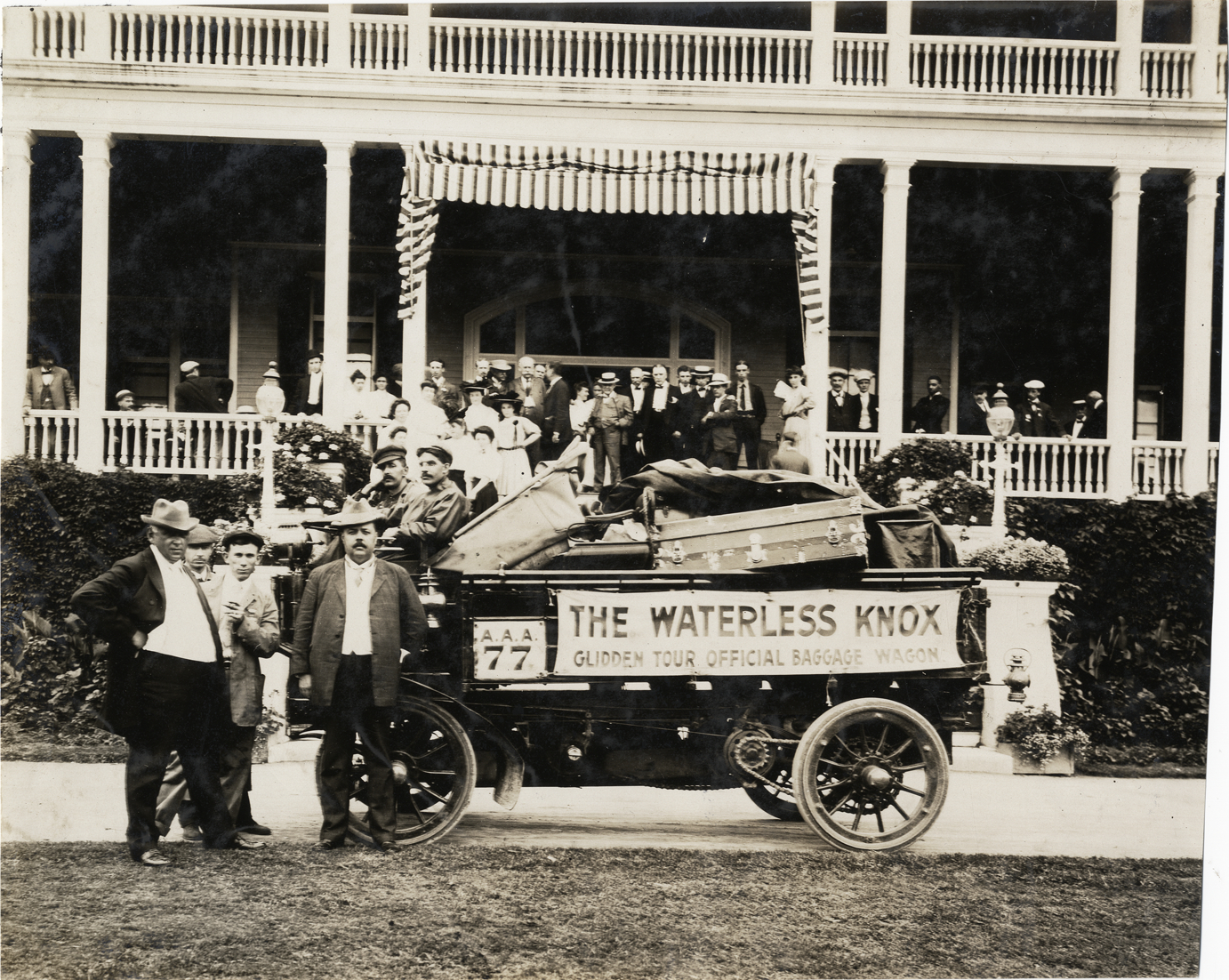 Charles Glidden posing next to Knox official baggage wagon, 1906 ...