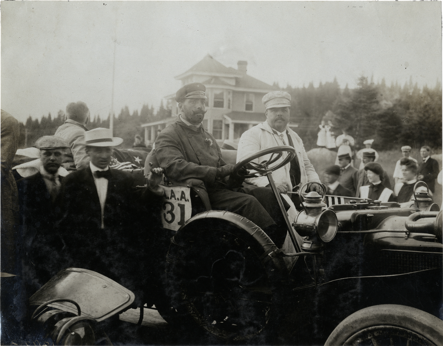 Augustus Post and Charles Glidden posing in White Steamer automobile ...