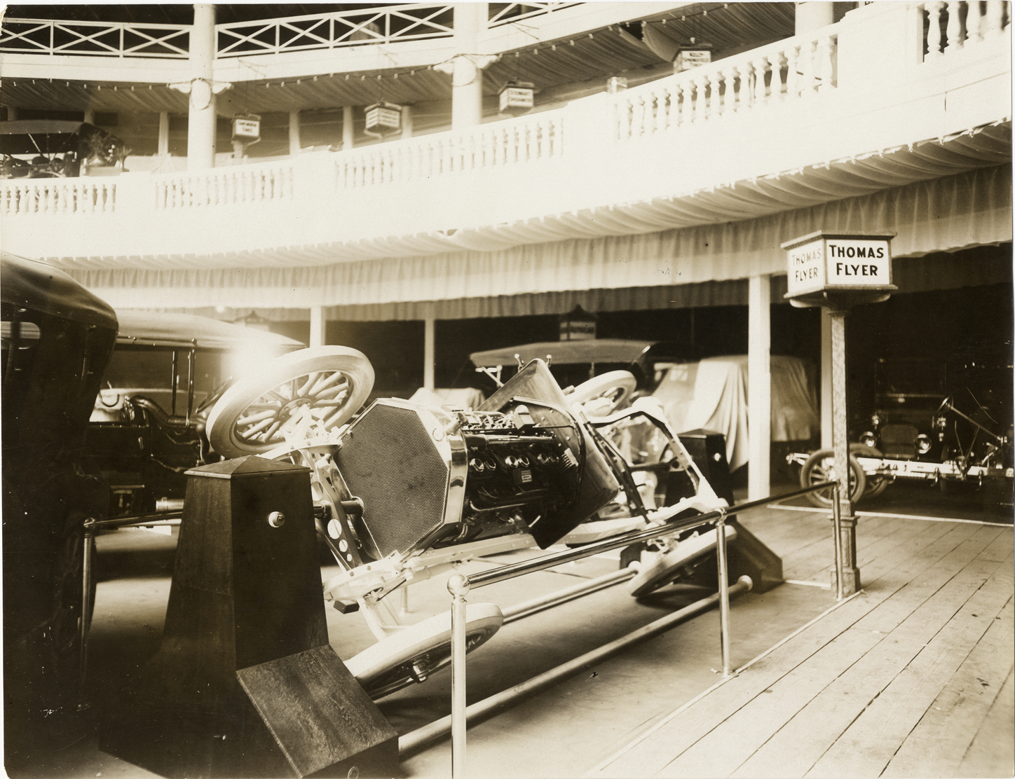 Thomas Flyer automobile chassis in trade show | DPL DAMS