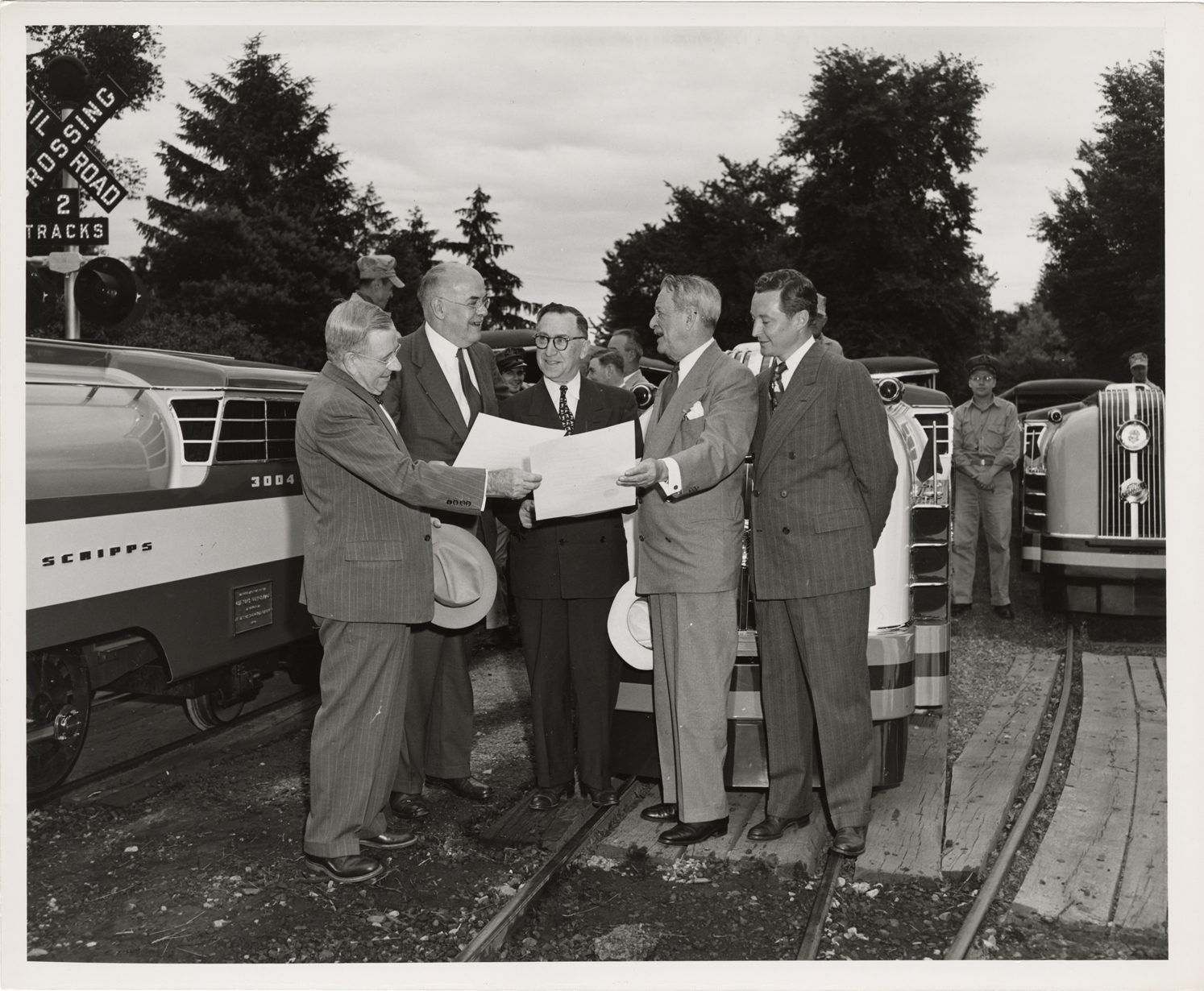 Dignitaries posing in front of locomotives for Detroit Zoo miniature ...