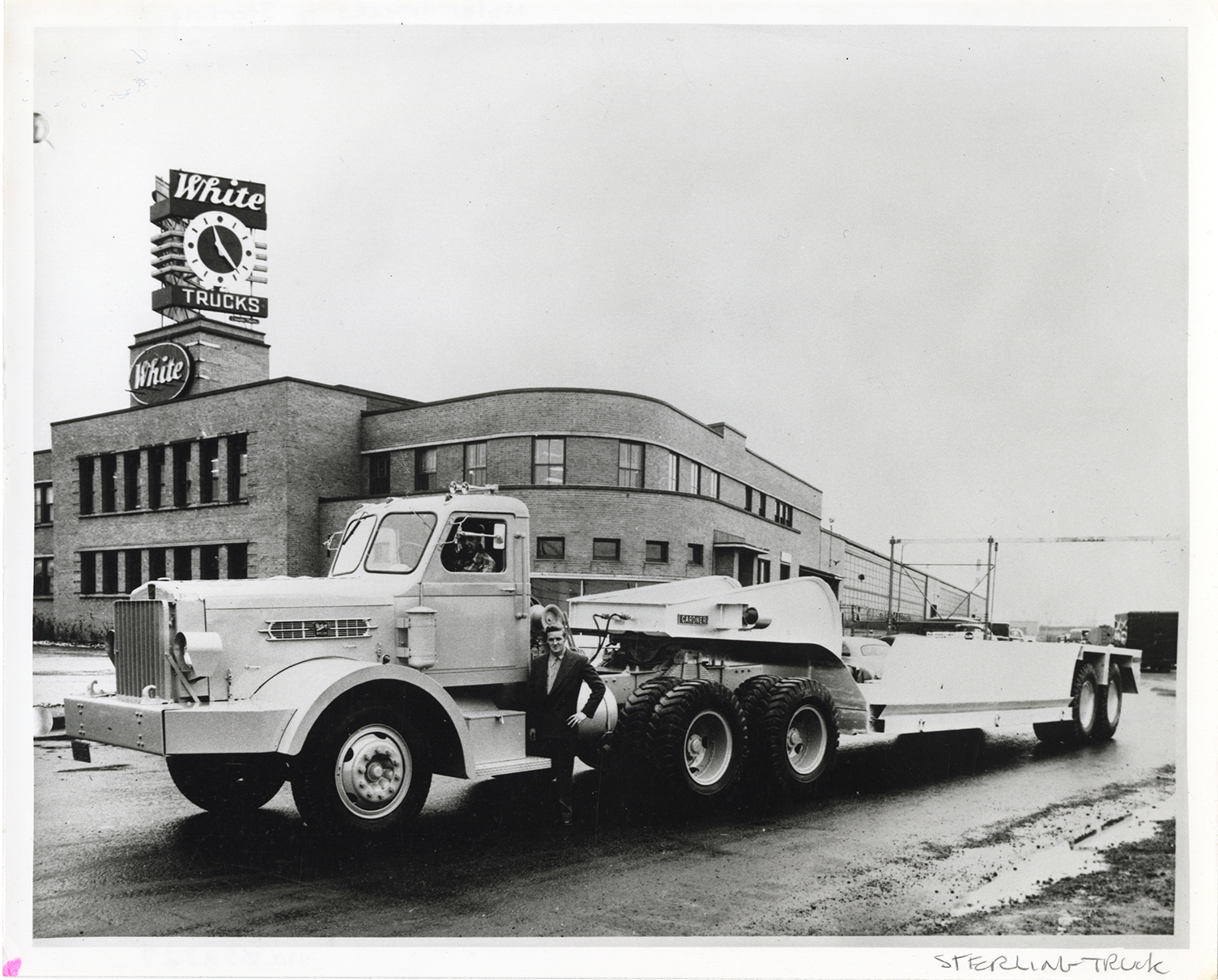 Two men posing with Sterling truck | DPL DAMS